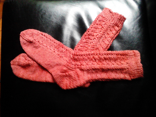 Ravelry: A Charming Twist Socks pattern by Denise Bein Kroll