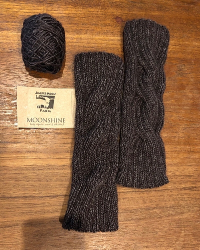 Ravelry: Swirling Cable Gauntlets pattern by Lady Violette de Courcy