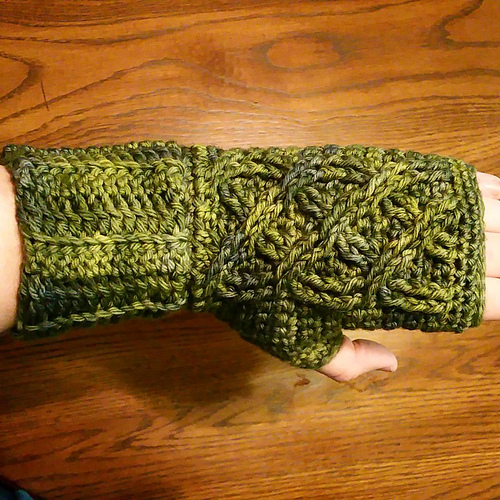 Ravelry: Celtic Cable Fingerless Mittens pattern by Jennifer Ozses