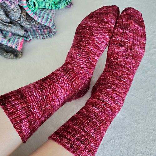 Ravelry: Broken Record Broken Rib Socks pattern by Alex Parker Mooney