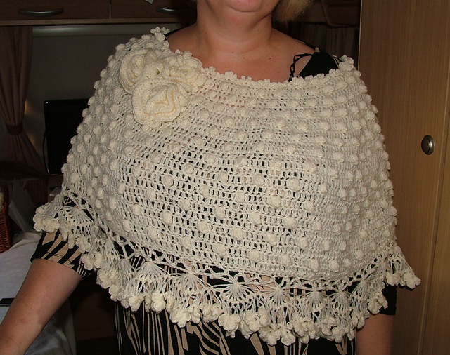 Ravelry: Shoulder Warmer with Rose Corsage pattern by Andrea Gaskell