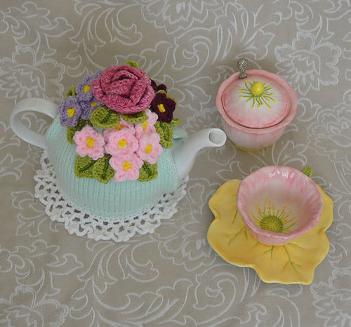 Ravelry: Violets & a Rose Tea Cosy pattern by Marcelline Simonotti