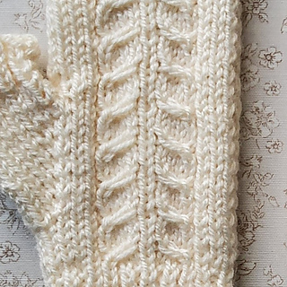 Ravelry: Cabled Fingerless Mittens with Thumbs pattern by marianna mel