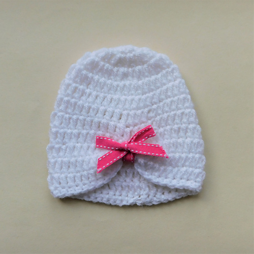 Ravelry: Ribbon Bow Baby Hat pattern by marianna mel