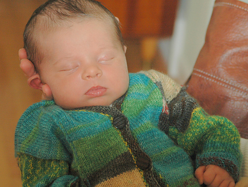 Ravelry: Patches Baby Sweater pattern by Christiane Burkhard
