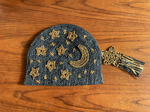 Ravelry: ʻĀnuenue Zip Clutch pattern by Meredith Buck