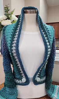 Ravelry: Cropped Feather Stitch Cardi pattern by Merri Purdy - Purdy ...