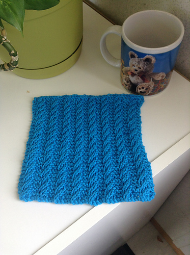 Ravelry: Garter Twist Dishcloth pattern by Faith Schmidt