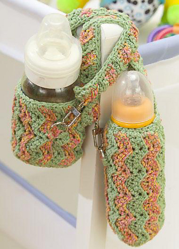Ravelry: Baby Bottle Cozy & Bib pattern by Ellen Gormley