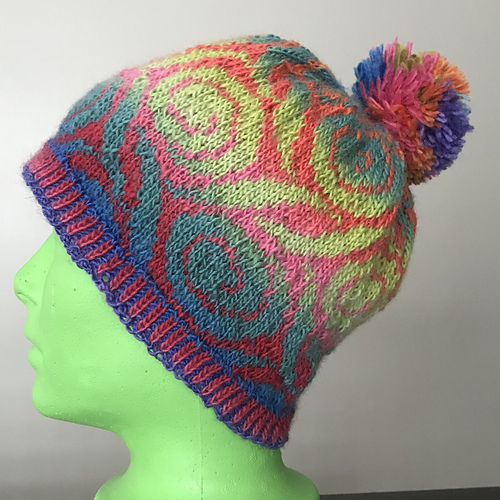 Ravelry: Rosette Ombre Beanie pattern by A. Robinson
