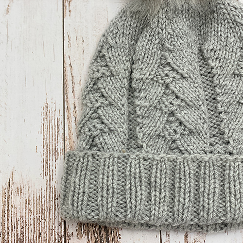 Ravelry: Pyramid Point Cap pattern by Shelby Nichols