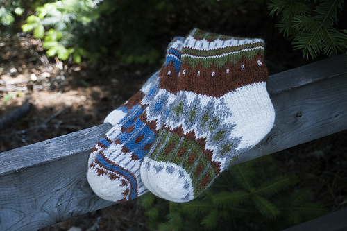 Ravelry: Cozy cottage socks pattern by Anna Radchenko