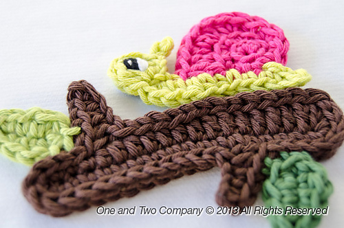 Ravelry: Snail and Branch Applique pattern by Carolina Guzman