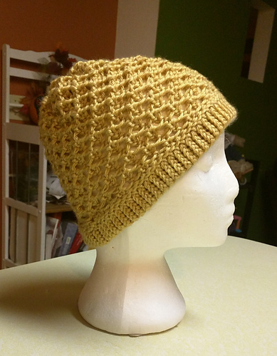 Ravelry: Reversible Eyelet Hat pattern by Peggy Overbey