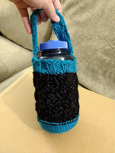 Ravelry: Cabled Water Bottle Carrier pattern by Lisa Ebert