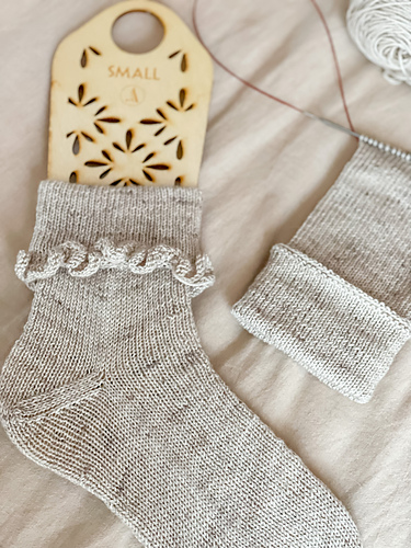 Ravelry: Sunday Ruffle Socks pattern by Megan Stevens