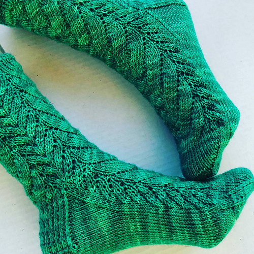 Ravelry: Equus Socks pattern by verybusymonkey