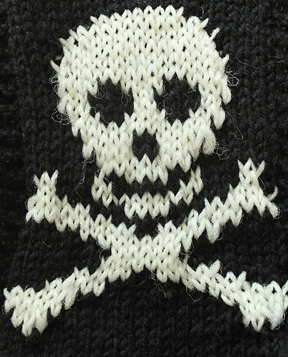 Ravelry: Pirate skull and cross bones scarf pattern by Becca Cook