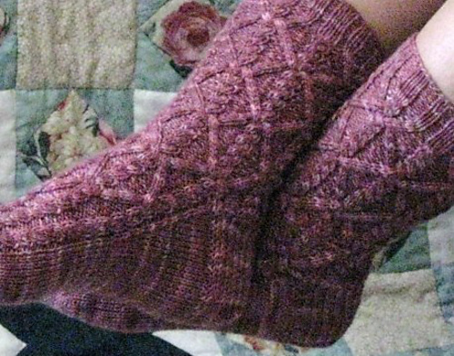 Ravelry: Romantic Entanglement Socks pattern by Cynthia Levy