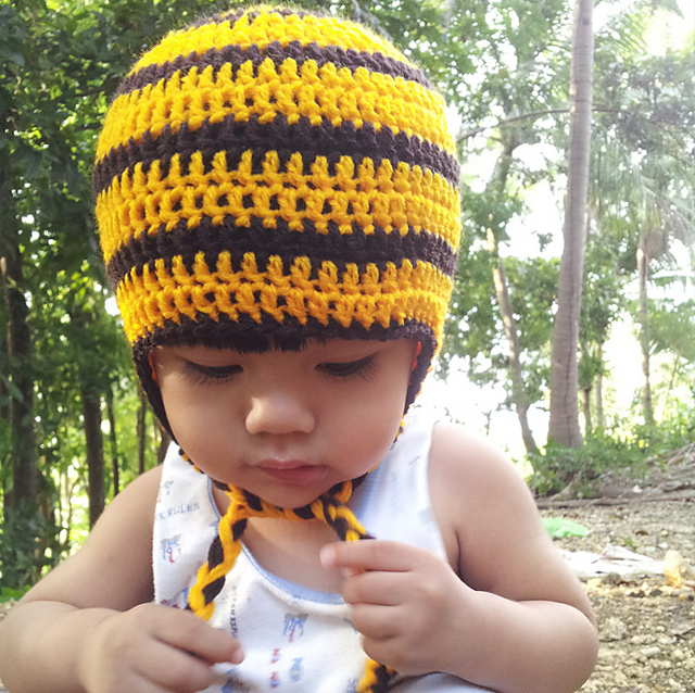 Ravelry: Simple Bee Hat With Earflaps and Braids pattern by Rhea Papellero