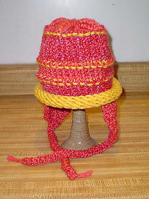 Ravelry: knifty knitter ear flap hat pattern by rostitchery