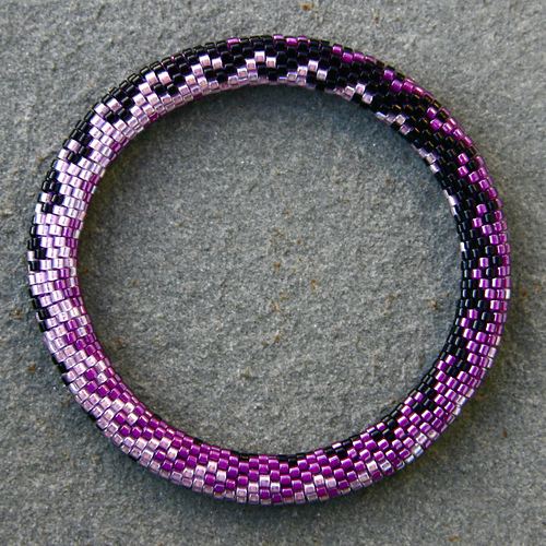 Ravelry: Tricolor Wave pattern by Ellie Baker and Susan Goldstine