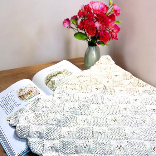 Ravelry: Eyelet Hearts Baby Blanket pattern by Silvermoon Knits
