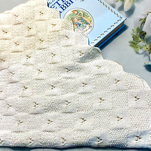 Ravelry: Eyelet Hearts Baby Blanket pattern by Silvermoon Knits