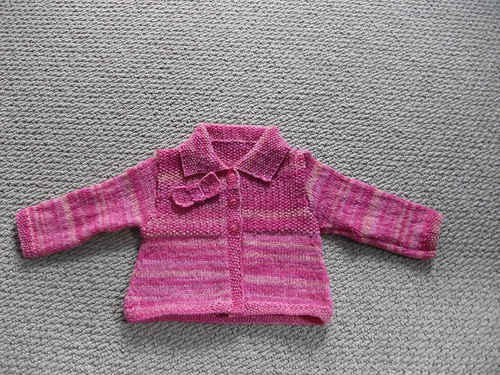 Ravelry: Moss Stitch Cardigan with Bow pattern by Sirdar