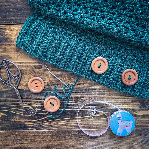 Ravelry: Buttons and Lace Scarf pattern by Sarah Romanoff