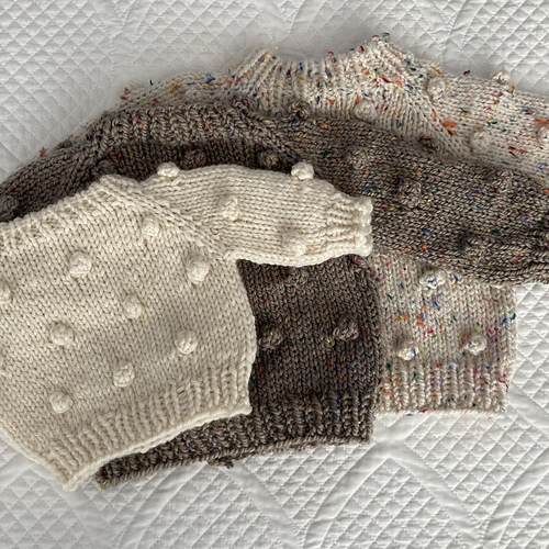 Ravelry: Baby Bobble Sweater pattern by Sarah Weidinger