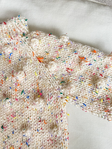 Ravelry: Baby Bobble Sweater pattern by Sarah Weidinger