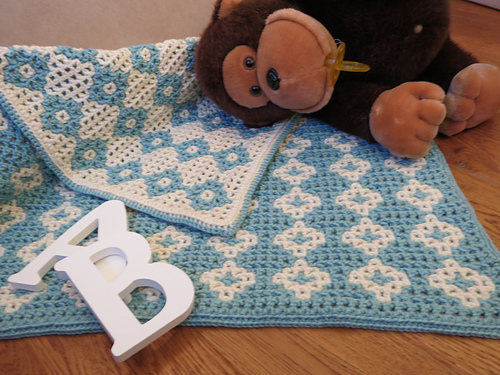 Ravelry: Diamonds in the Rough Baby Mat pattern by Tanis Galik