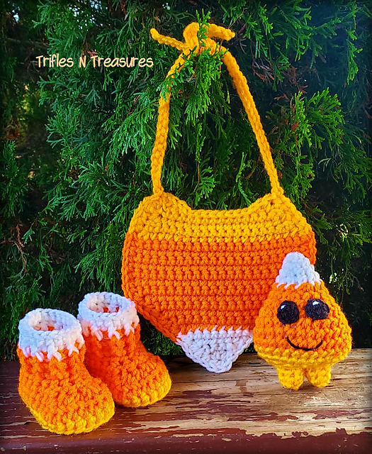 Ravelry: Candy Corn Boots, Bib and Stuffie Set pattern by Tera Kulling