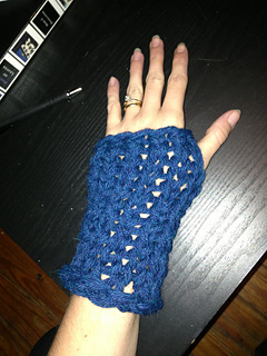 Ravelry: Four Strand Quick Knit Wristlets pattern by Julia Martinez